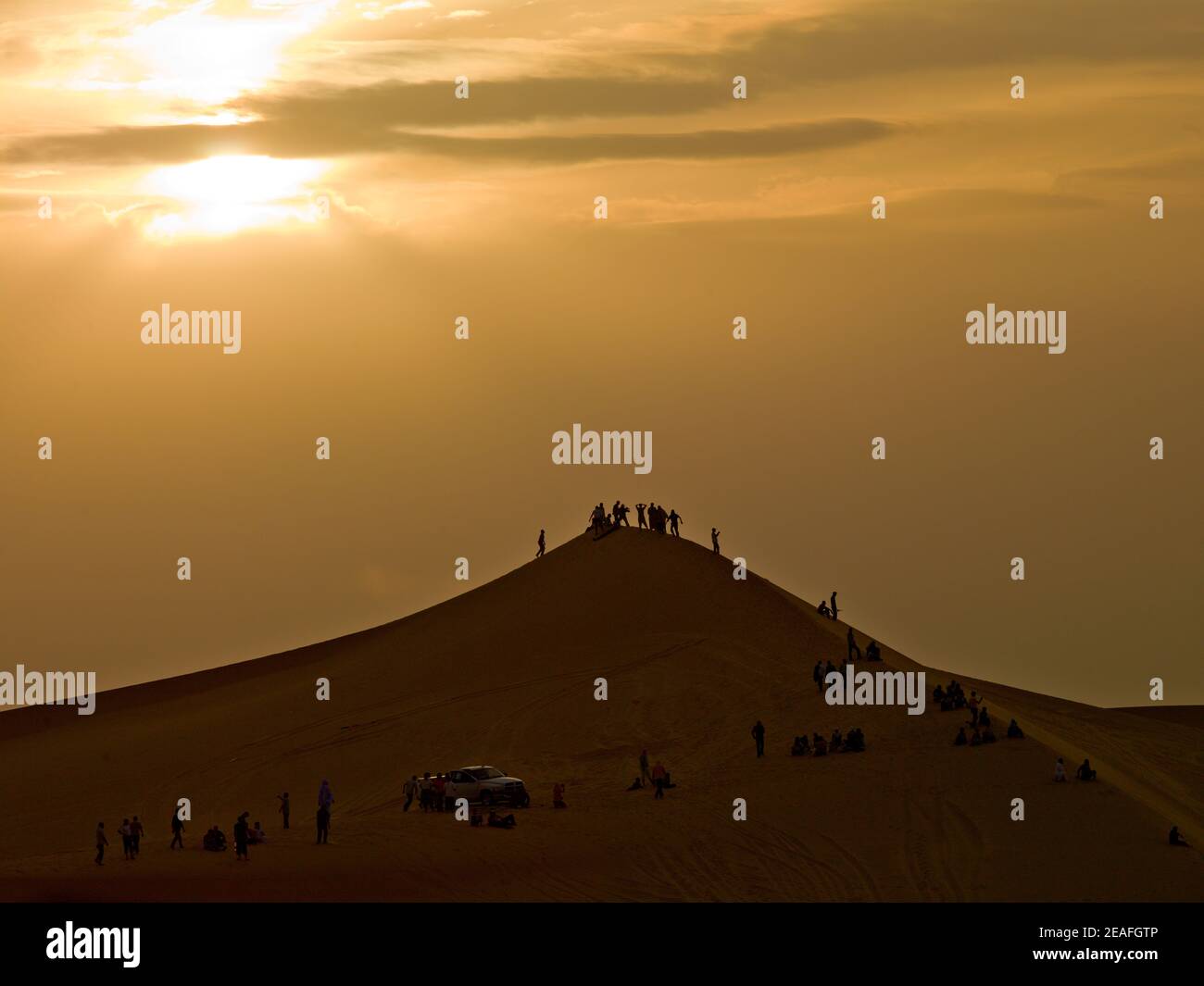 People in the desert on a dune, Tripolitania, Ghadames, Libya Stock ...
