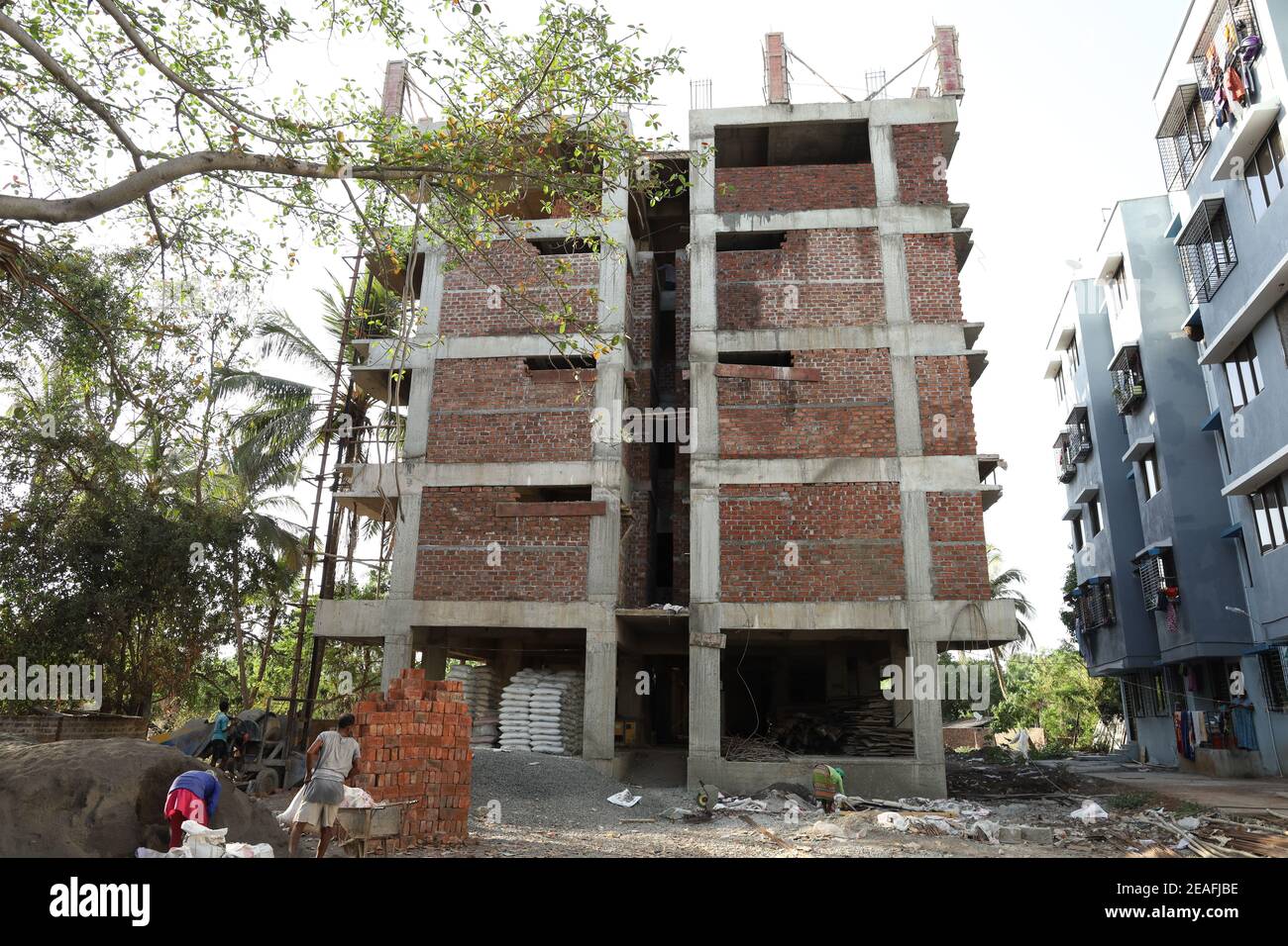 A under construction building and apartment with 4 floors and 1 ground ...