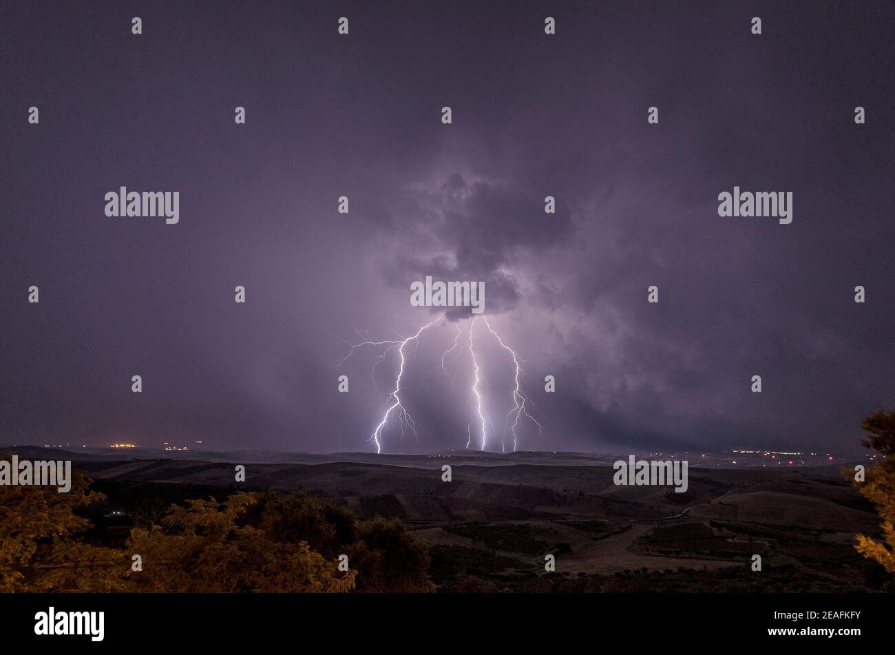 Beautiful night sky with lightning and thunderbolts during a ...