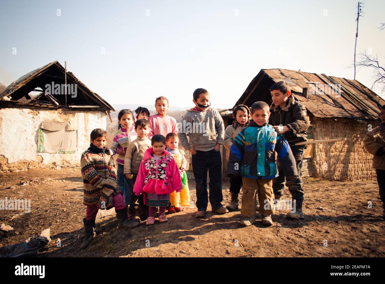 SEREDNIE, UKRAINE - MARCH 09, 2011: children living in a small poor ...