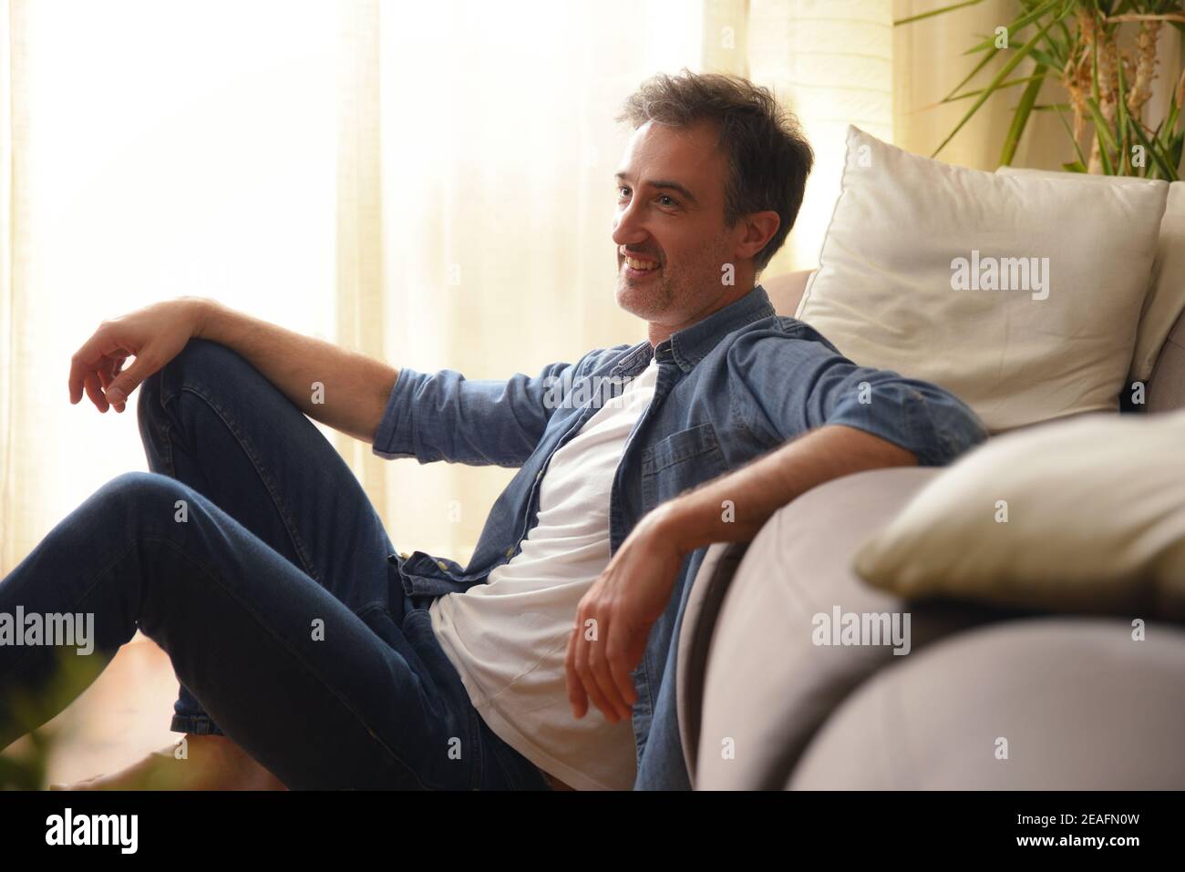 Smile happy think relaxed think hi-res stock photography and images - Alamy