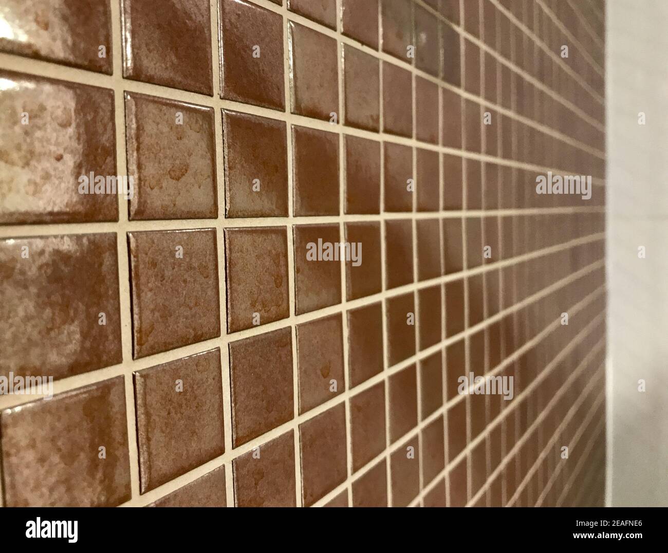 Wall design with brown tiles Stock Photo - Alamy