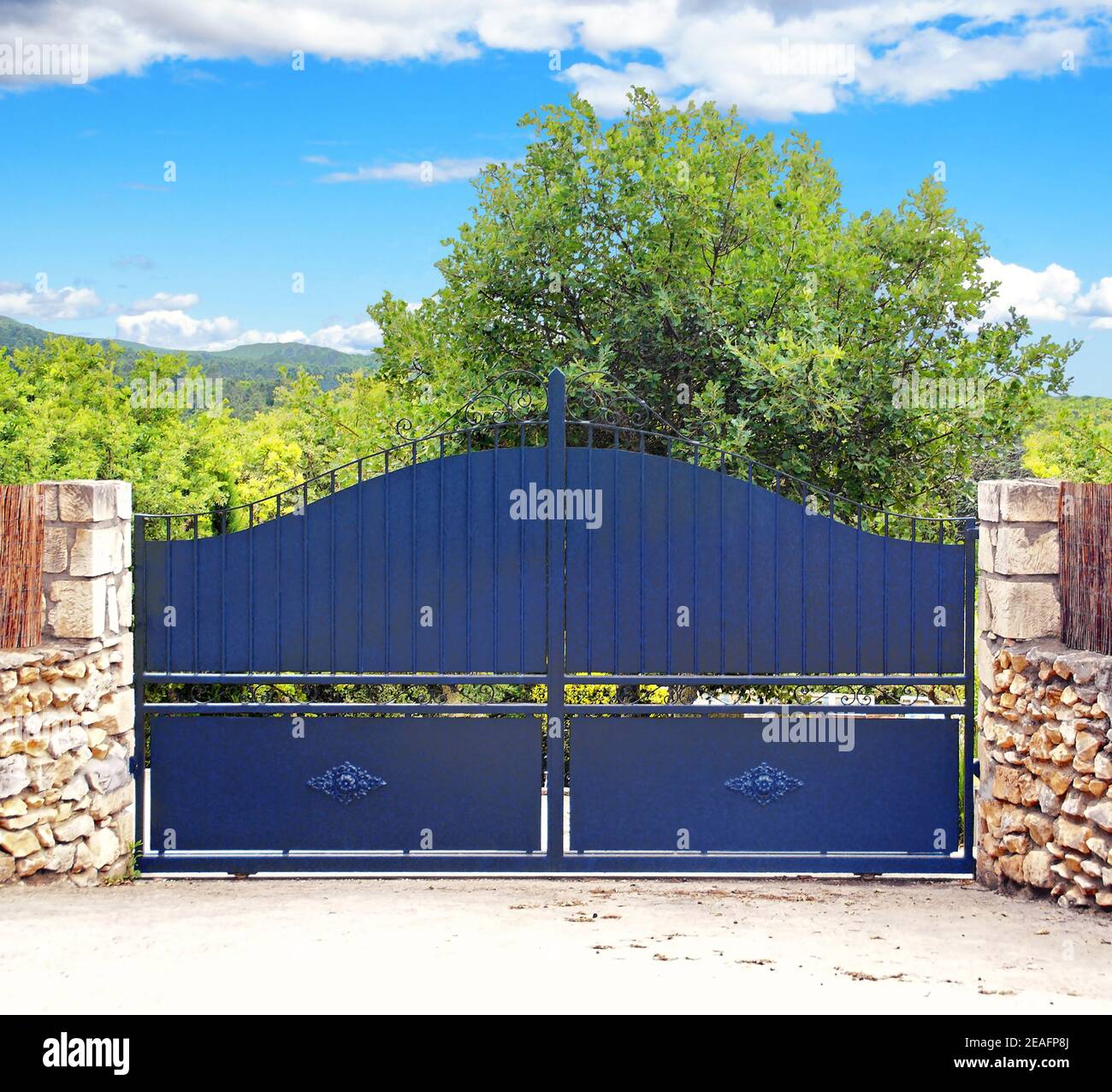 Metal Gates With Stone Columns