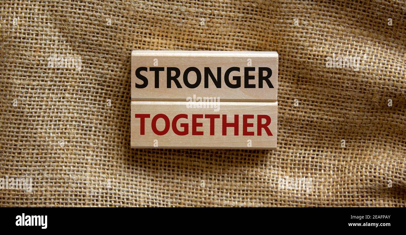 Stronger together symbol. Concept words 'stronger together' on wooden ...