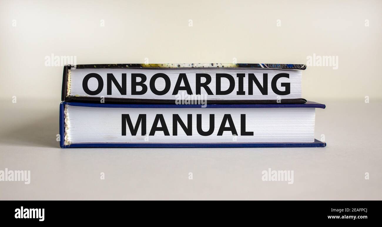 Onboarding manual symbol. Books with words 'onboarding manual' on beautiful white background ...