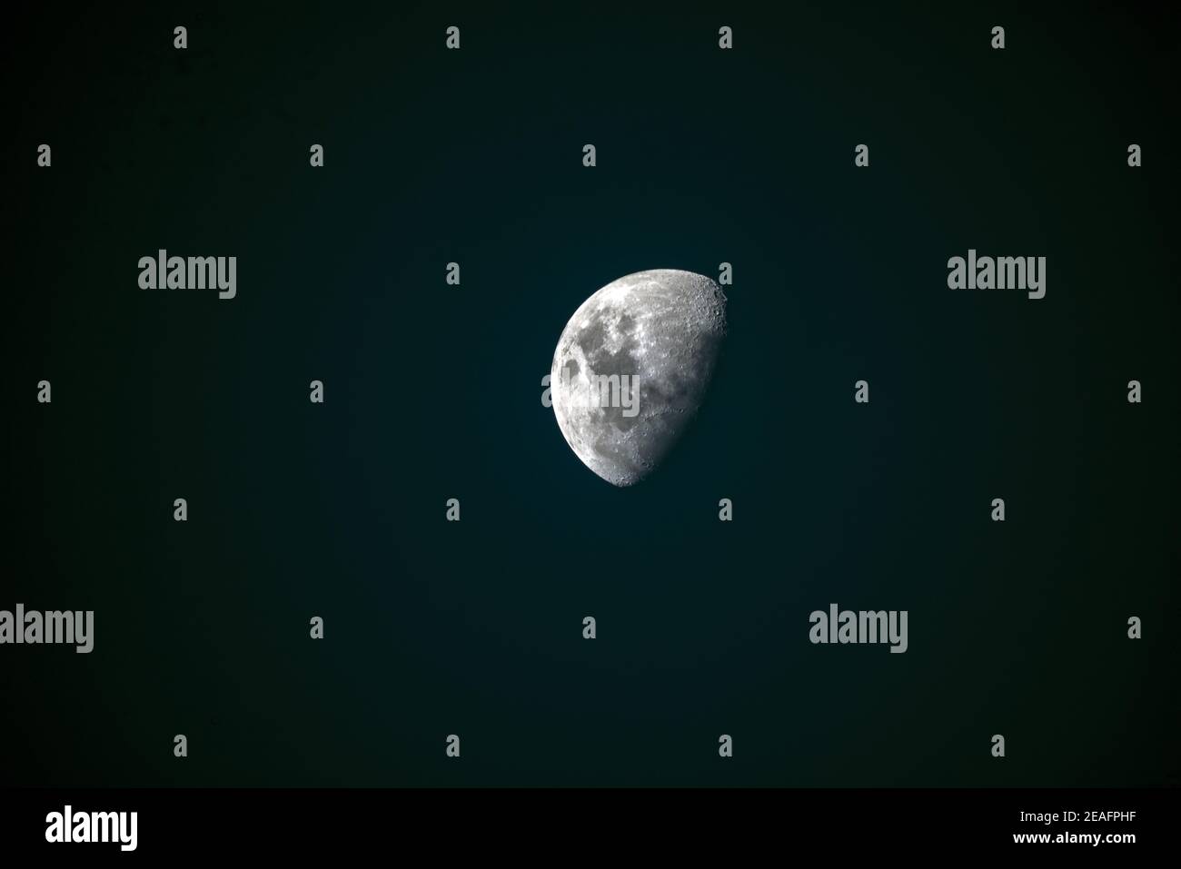 Beautiful shot of the half-moon in a black sk Stock Photo - Alamy