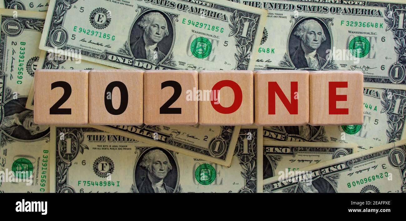 Business concept of planning 2021. Wooden cubes with the words '202one ...