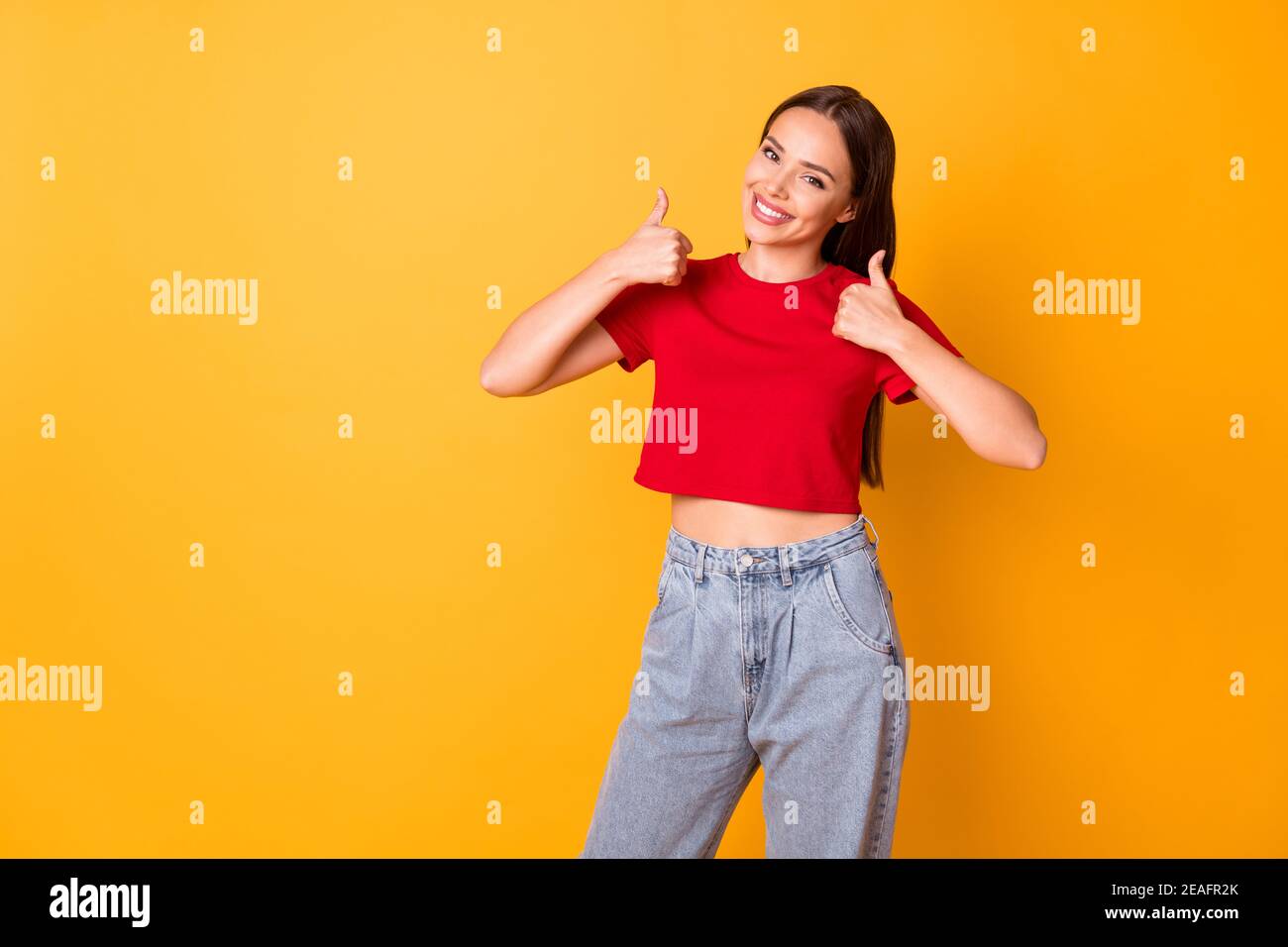 Photo of confident lady hold hands raise thumb fingers up wear casual ...