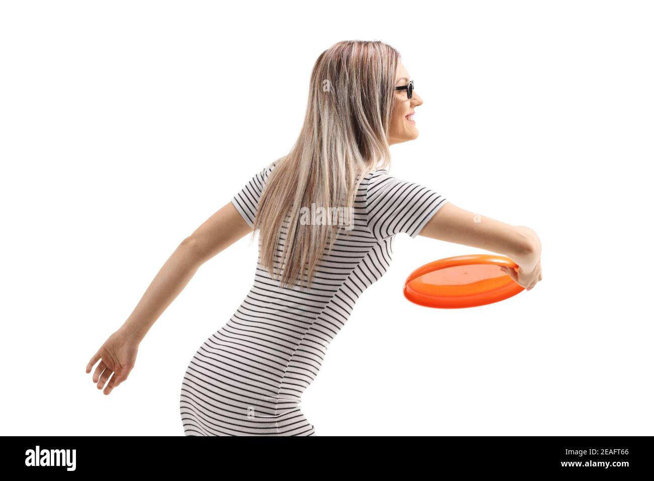 Young woman throwing a plastic disk isolated on white background Stock ...
