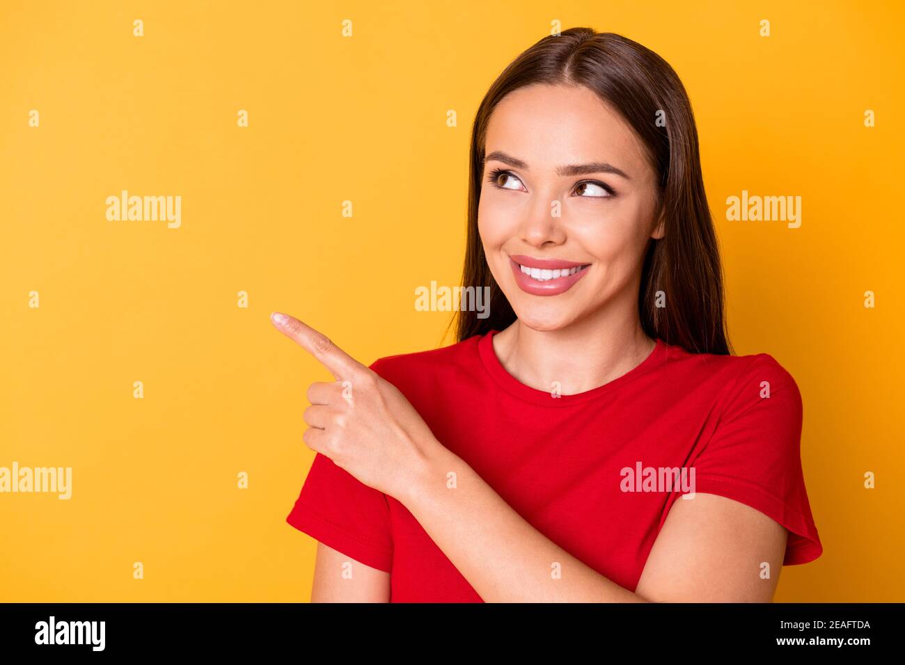 Photo of pretty interested lady direct index finger side empty space ...