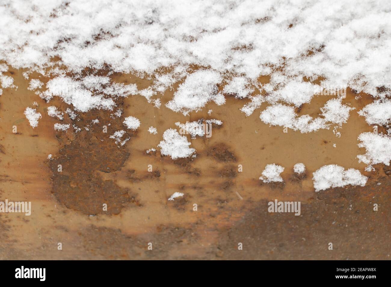 Snow on rusty metal texture background close up Stock Photo - Alamy
