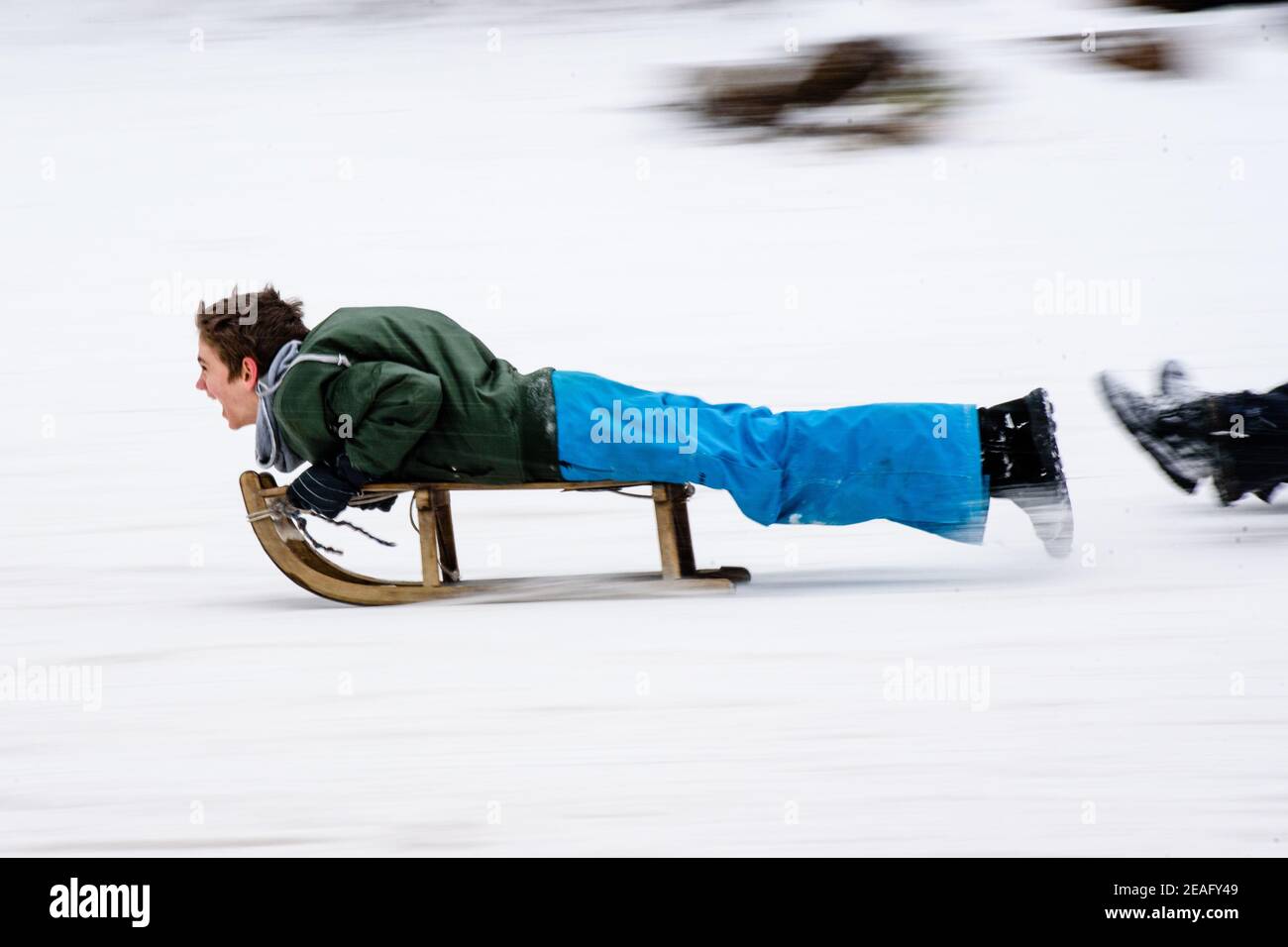 Berlin, Berlin, Germany. 9th Feb, 2021. A boy rides a sled headfirst at ...