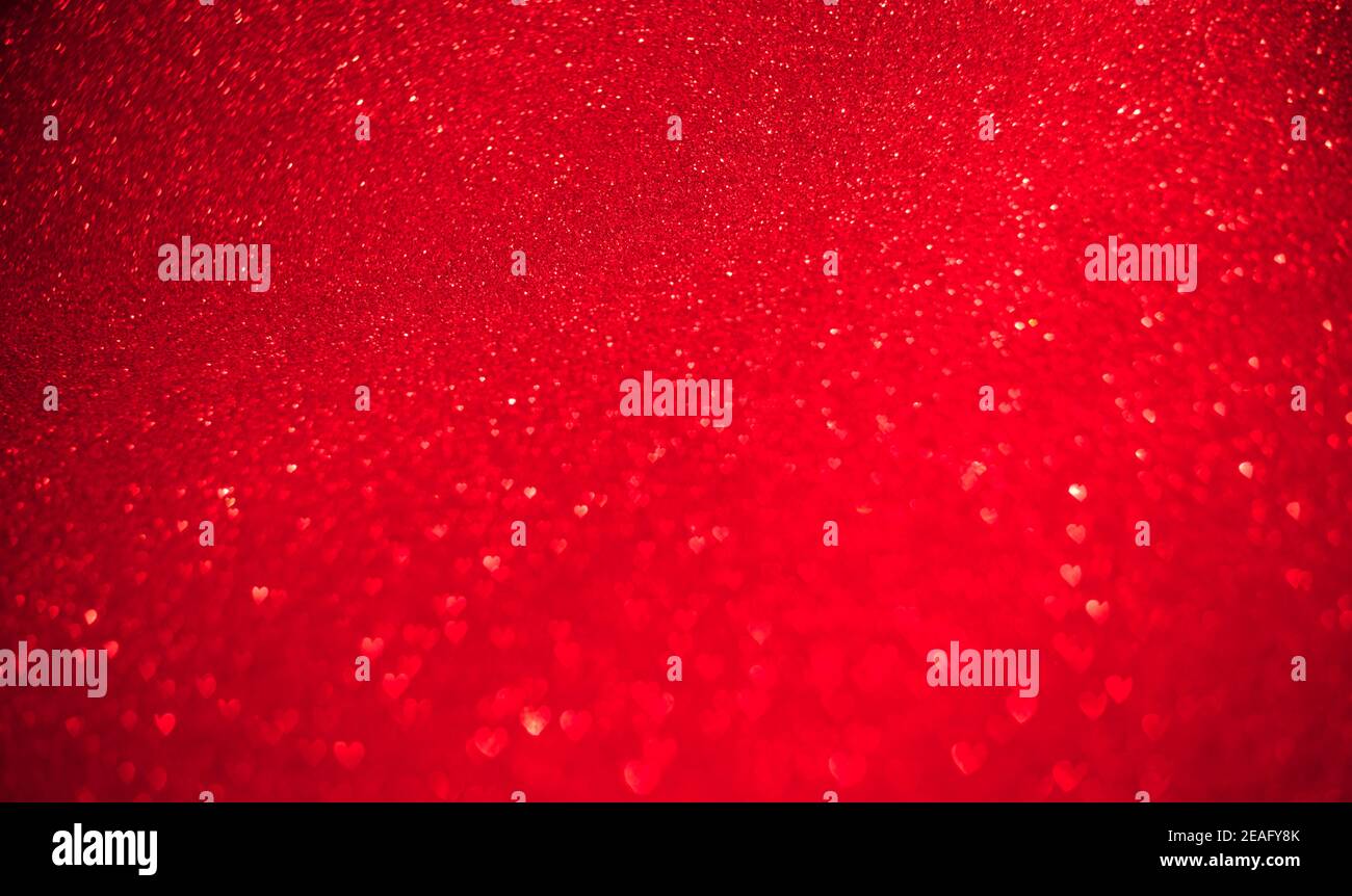 Red background of blurred hearts, side of defocus Stock Photo - Alamy