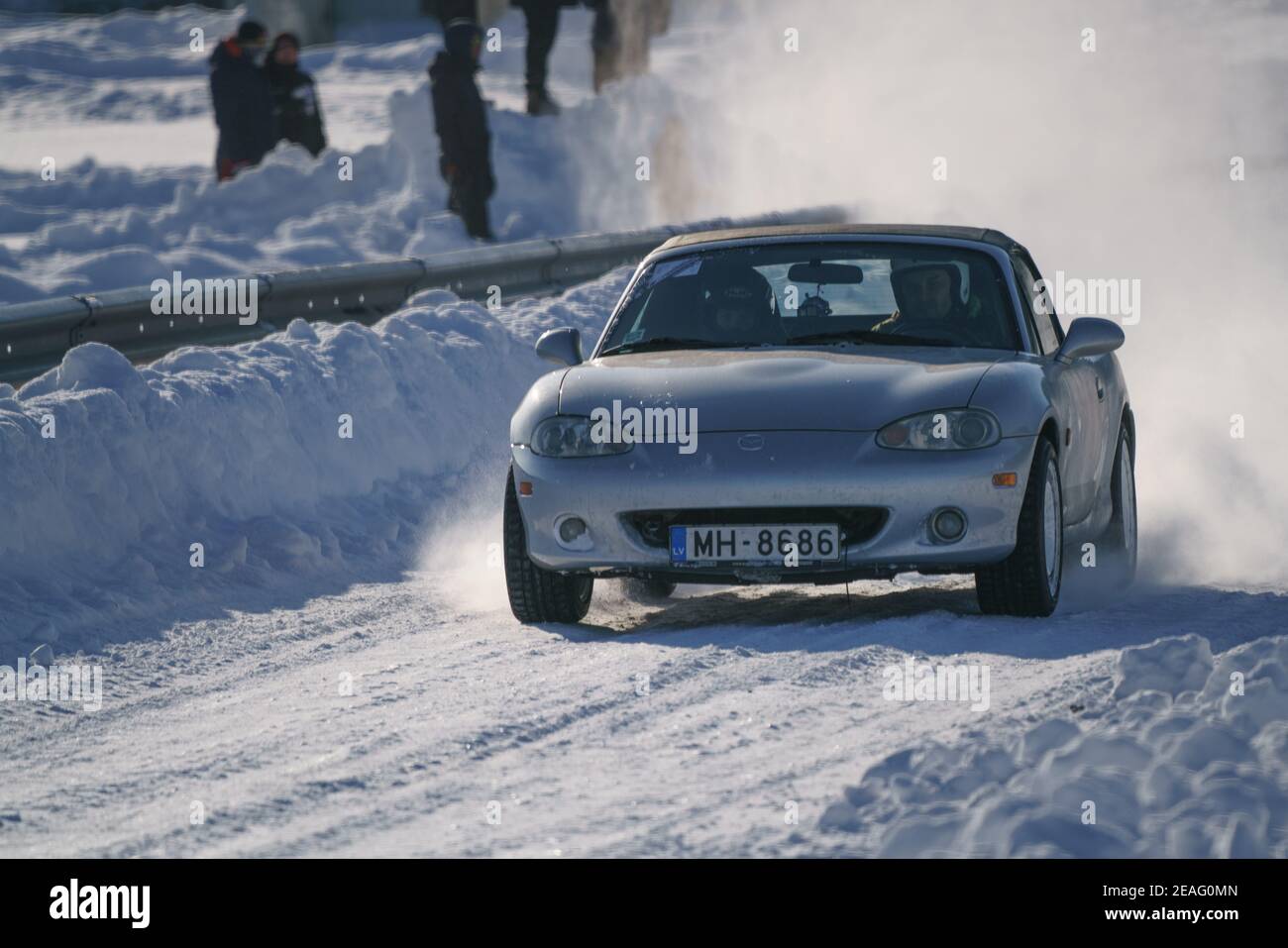 extreme driving, the car is moving rapidly over the smooth snow and ...