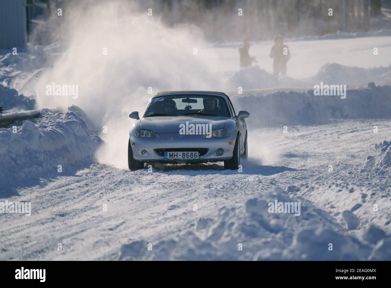 extreme driving, the car is moving rapidly over the smooth snow and ...