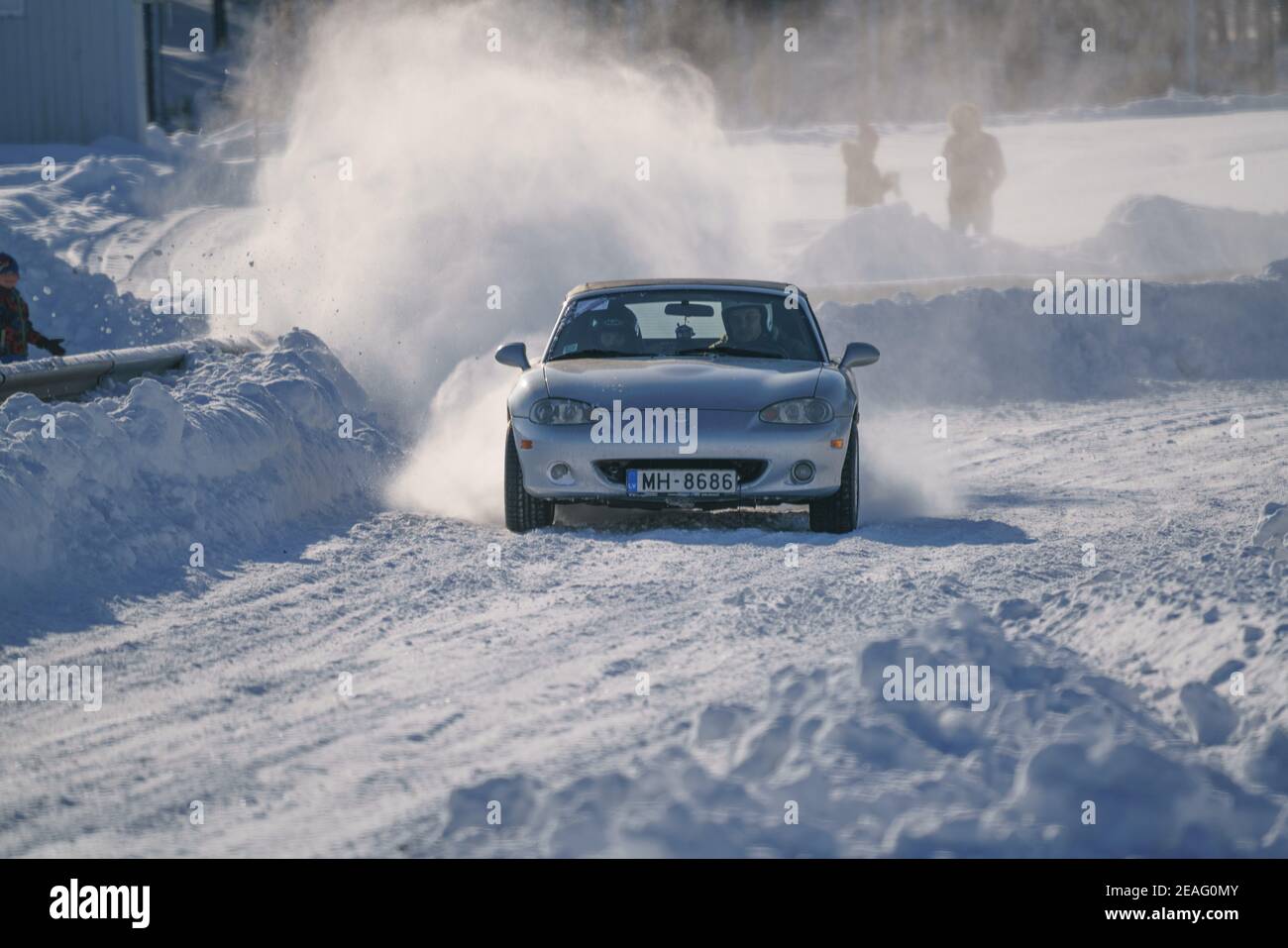 extreme driving, the car is moving rapidly over the smooth snow and ...