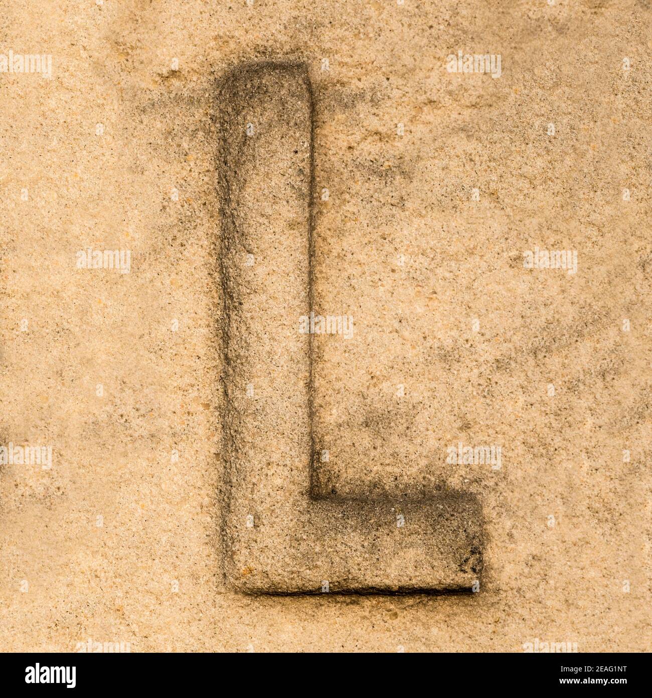 Weathered sandstone letter L Stock Photo - Alamy
