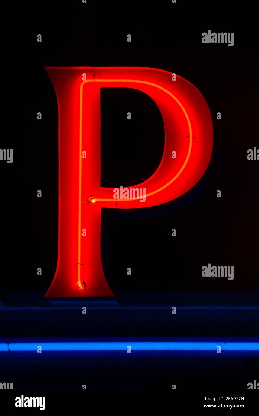 Bright red neon letter P Stock Photo - Alamy