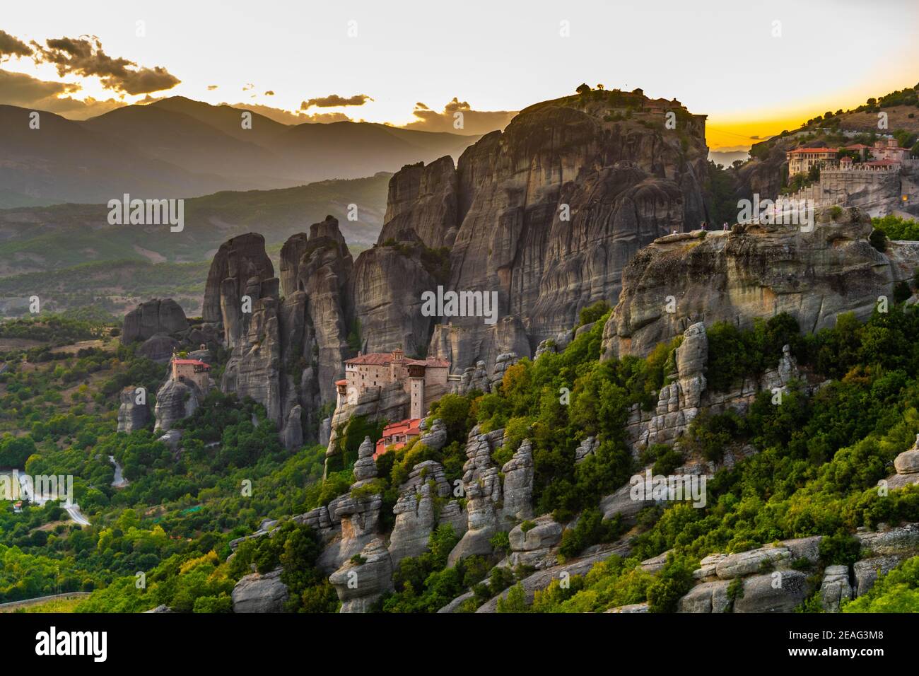 Sunset over Meteora in Greece Stock Photo - Alamy