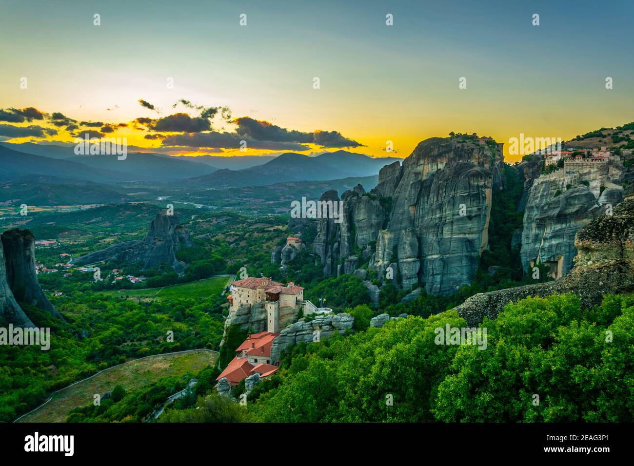 Sunset over Meteora in Greece Stock Photo - Alamy