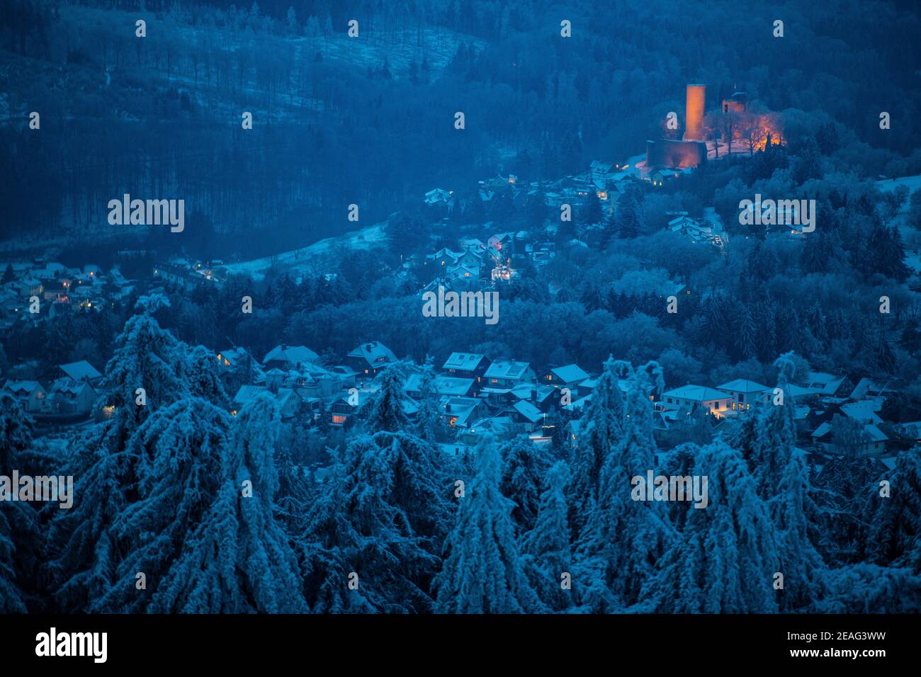 Schmitten, Germany. 09th Feb, 2021. The lights of the houses of ...