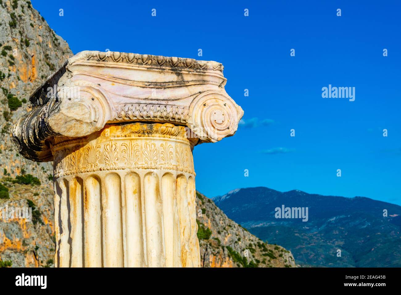 an old column situated at the ancient Delphi site in Greece Stock Photo ...