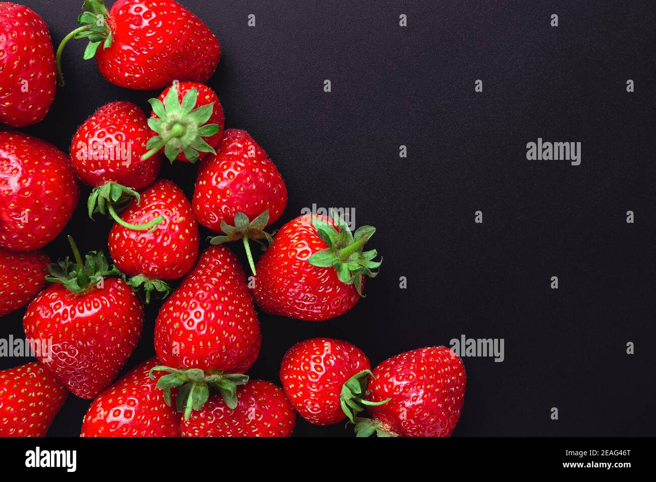 Red ripe strawberry background. Elegant dark background with red ...