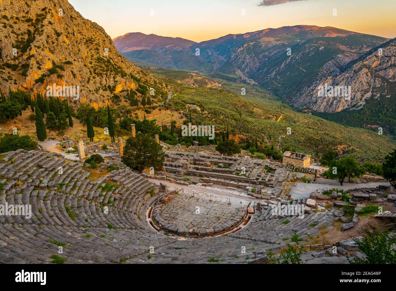Sunset view of ruins of theatre at ancient Delphi, Greece Stock Photo ...