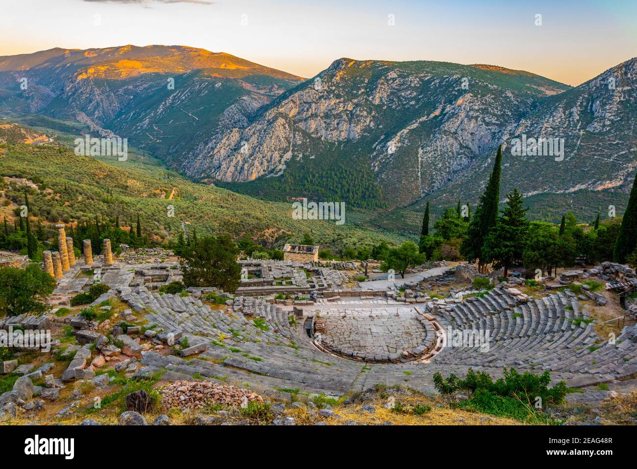 Sunset view of ruins of theatre at ancient Delphi, Greece Stock Photo ...