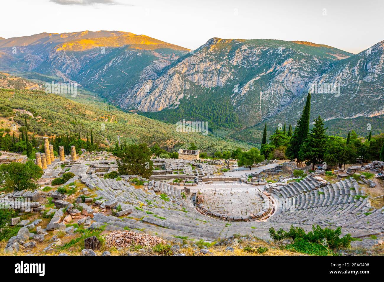 Sunset view of ruins of theatre at ancient Delphi, Greece Stock Photo ...