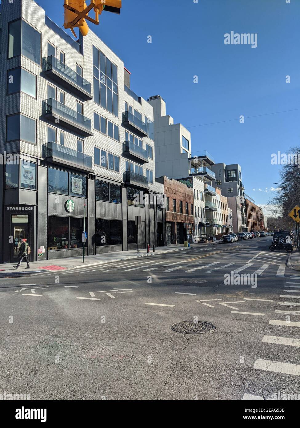New York , USA - October 20 2020: New apartment buildings and Starbucks ...