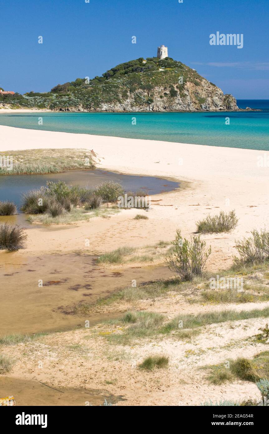 crystal clear water and white sand in Sa Colonia beach, Chia, Sardinia ...