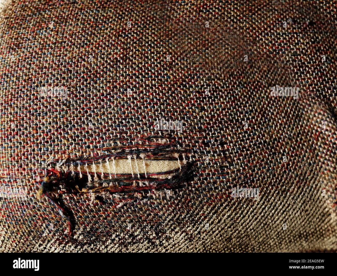 Torn fabric hi-res stock photography and images - Alamy