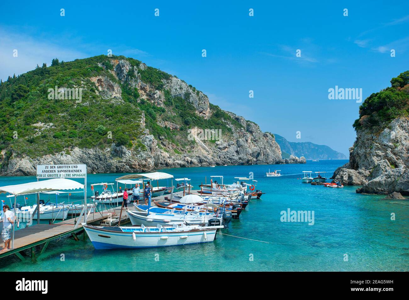 Boats at jetty, Agios Spyridon, Paleokastritsa, Corfu, Ionian islands ...