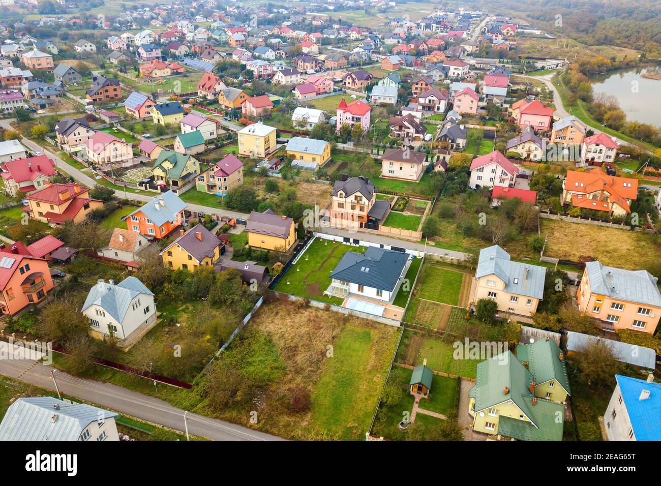 Flying over village residential neighbourhood hi-res stock photography ...