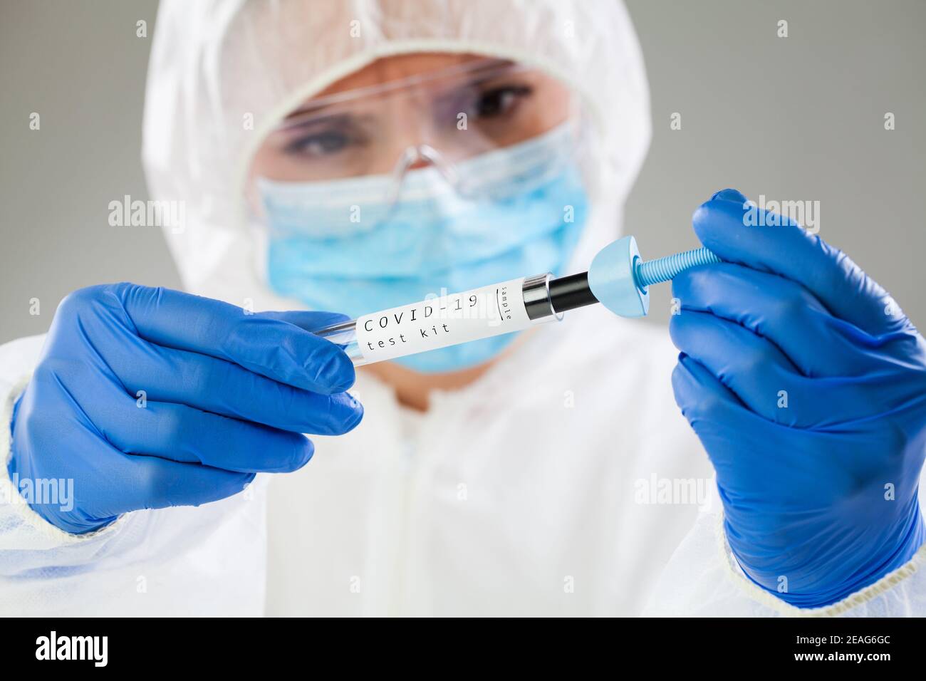 Medical technologist inspecting quick antigen test kit,COVID-19 virus ...