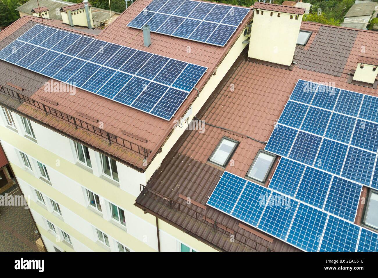 Aerial view of solar power plant with blue photovoltaic panels mounted ...