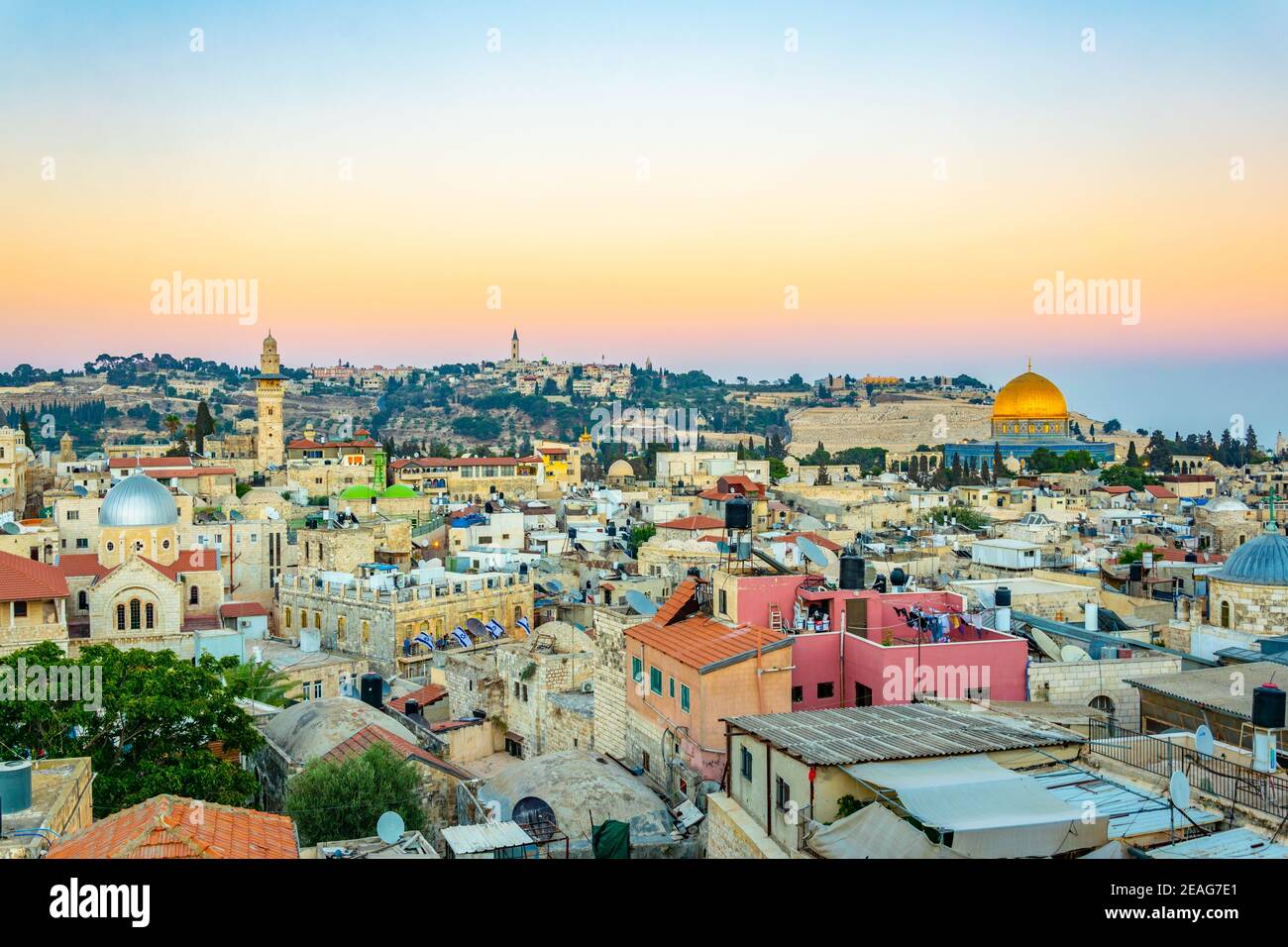 Sunset view of Jerusalem dominated by golden cupola of the dome of the ...