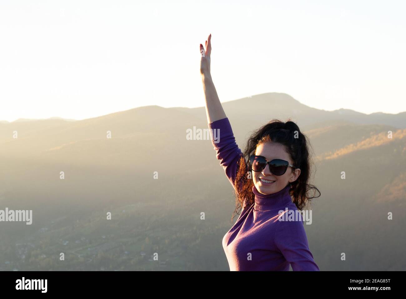 Woman raising hand portrait hi-res stock photography and images - Alamy