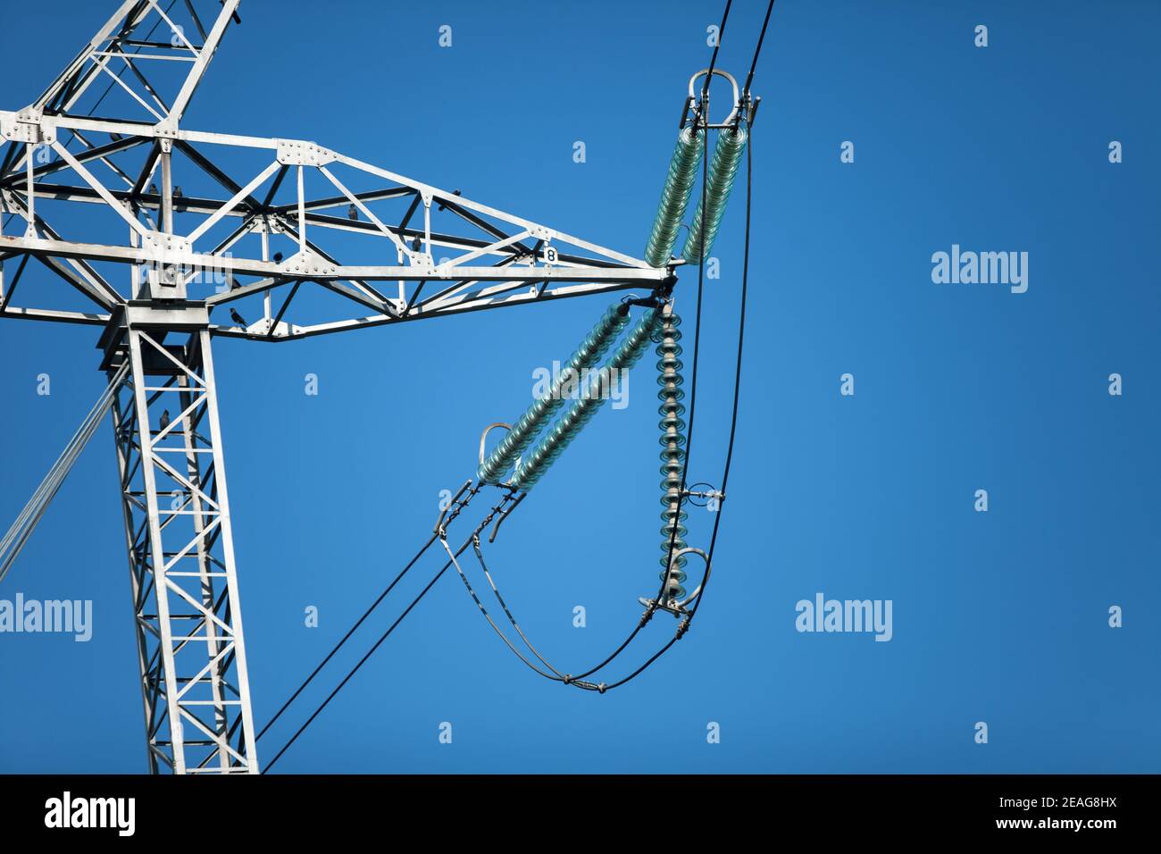 Low angle shot of overhead high-voltage power lines Stock Photo - Alamy