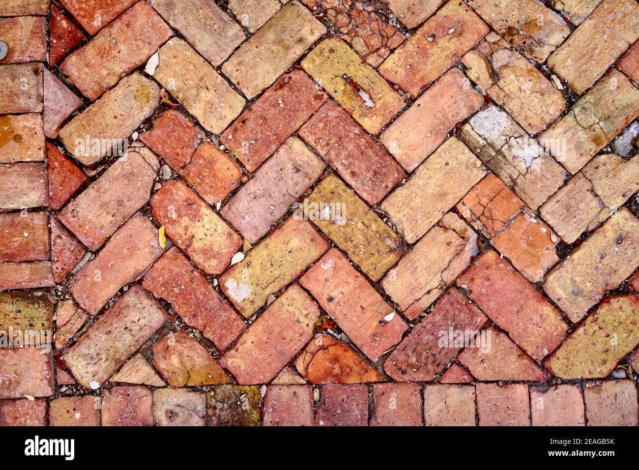 Bricks in Herringbone pattern in Key West, Florida, FL USA. Aged ...