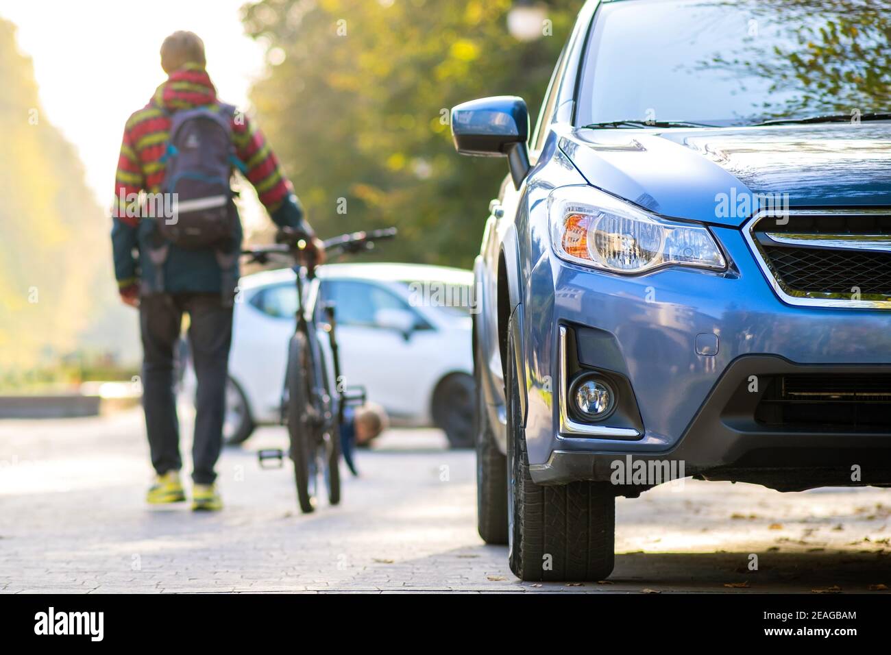 New clean car parked on a city street side Stock Photo - Alamy