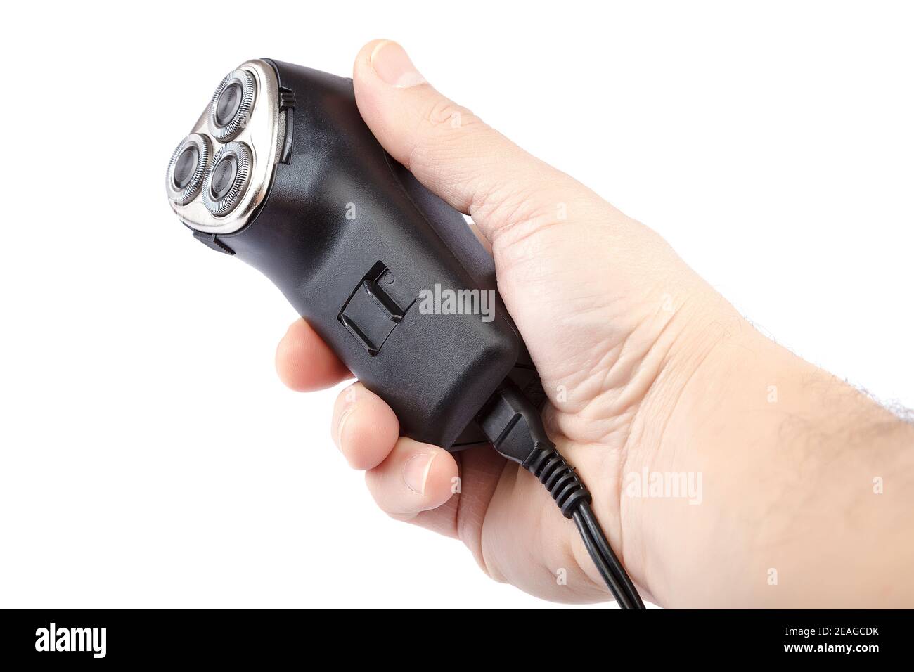 Electric razor in hand isolated on white background Stock Photo - Alamy