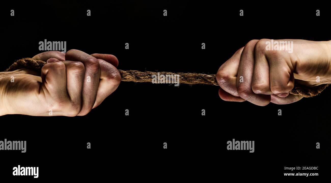 Rope, cord. Hand holding a rope, climbing rope, strength and determination. Rescue, help ...