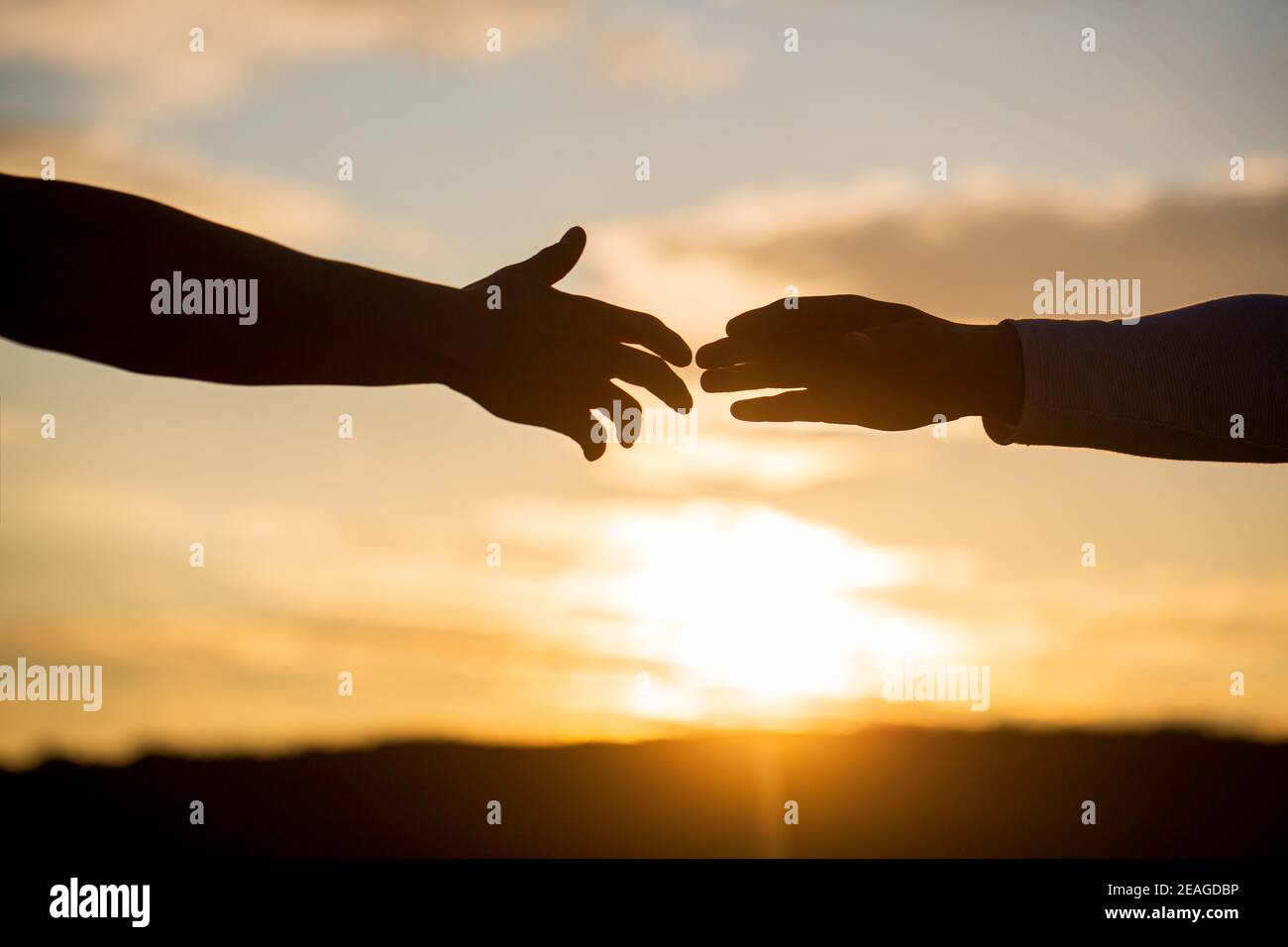Outstretched hands, salvation, help silhouette, concept help. Giving a helping hand. Rescue ...