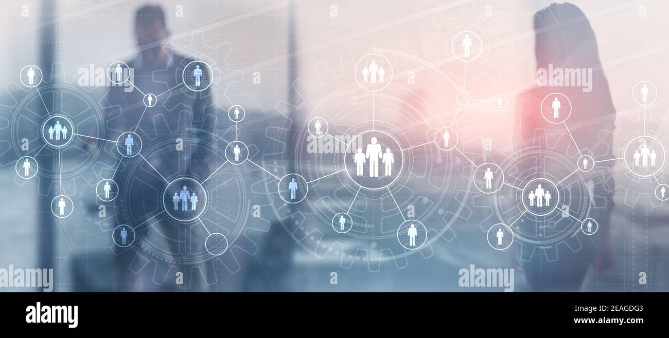 Teamwork. Gears on the background of a modern office building and ...