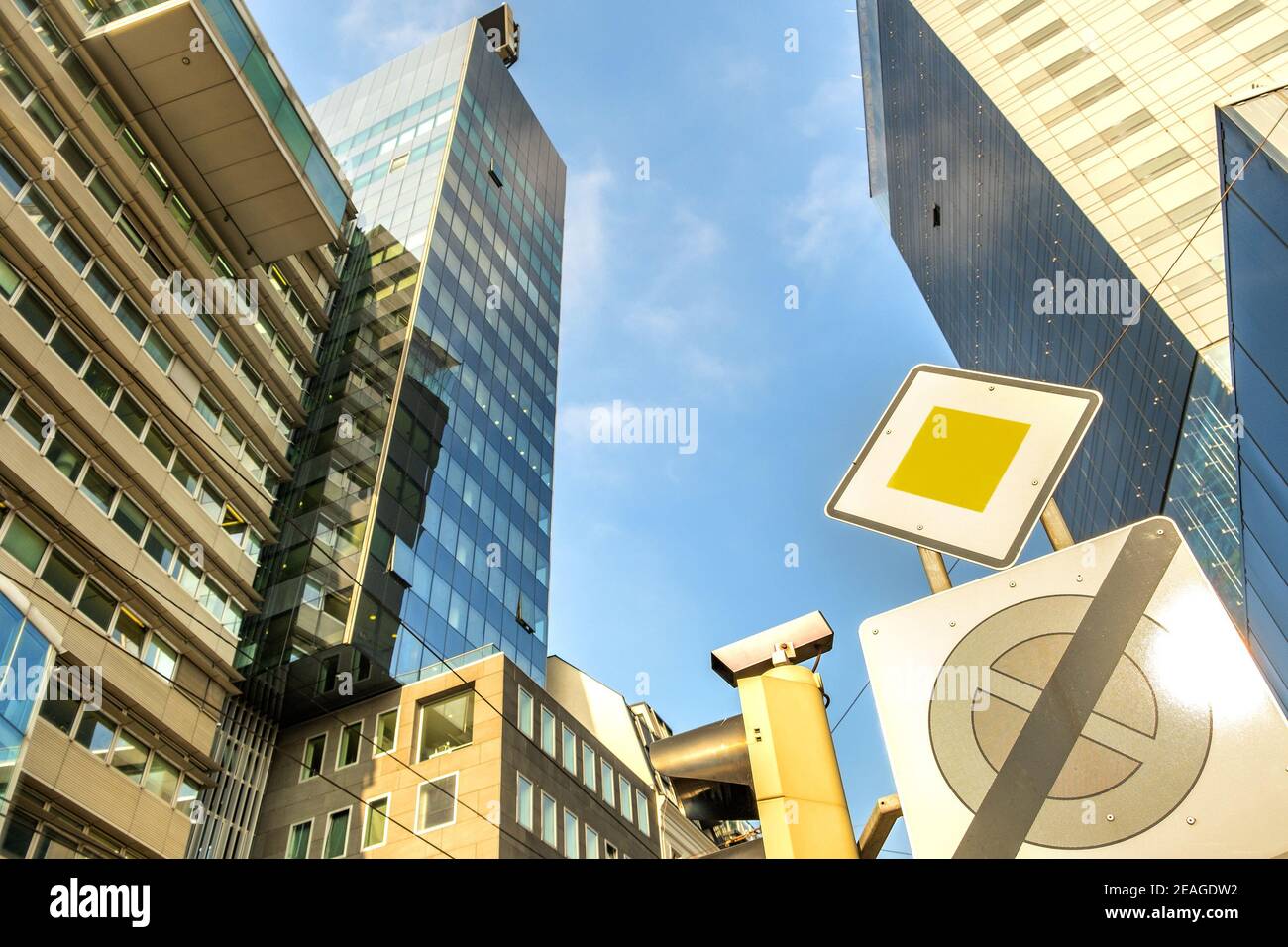 Perspective view of modern high-rise glass skyscraper building and main ...
