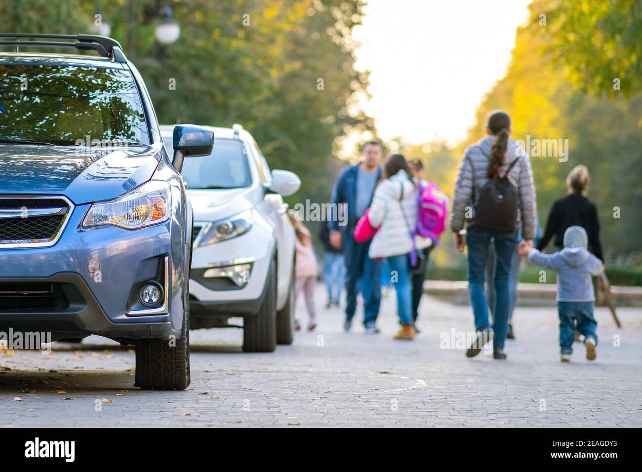 New clean car parked on a city street side Stock Photo - Alamy