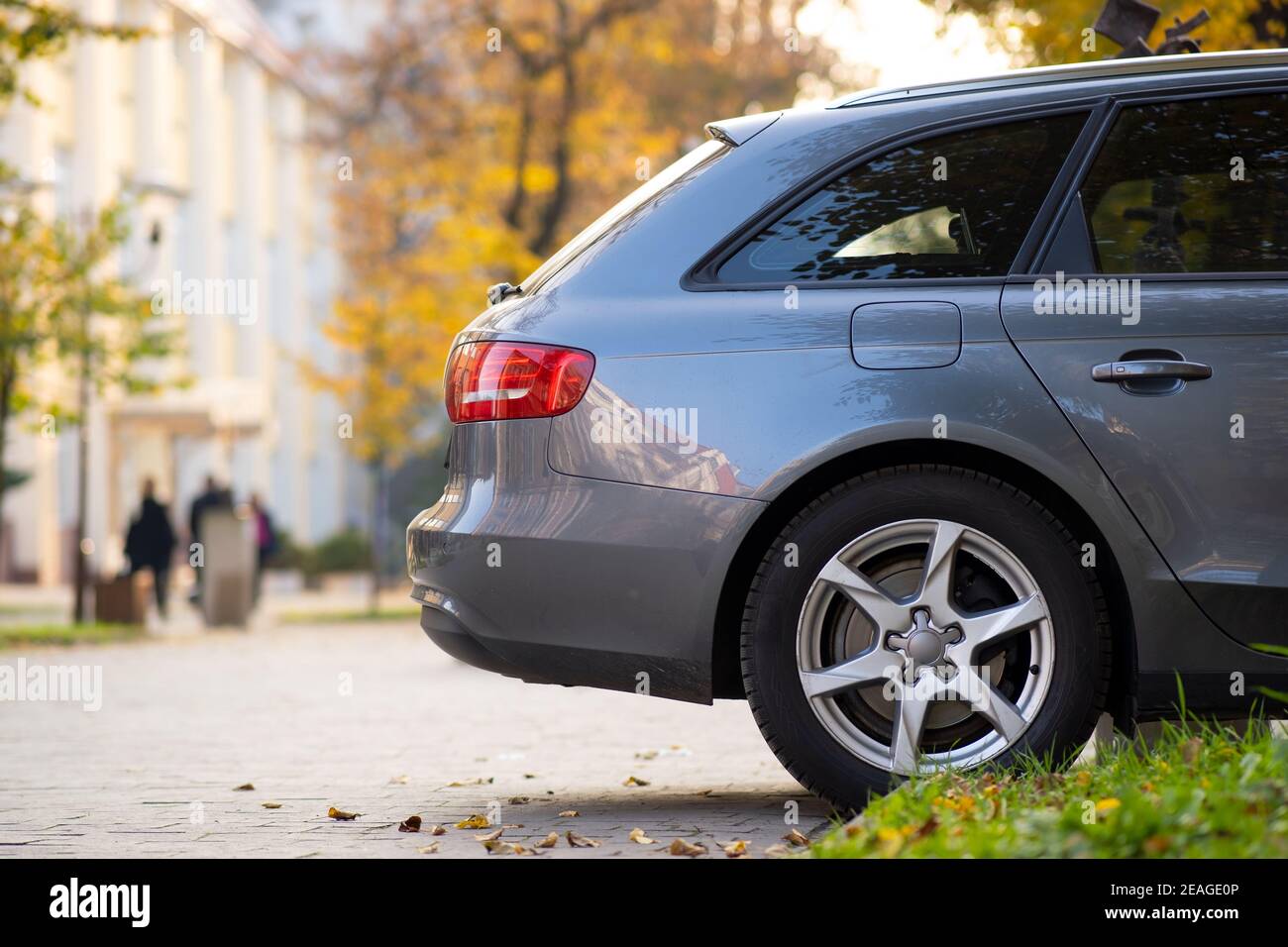 New clean car parked on a city street side Stock Photo - Alamy
