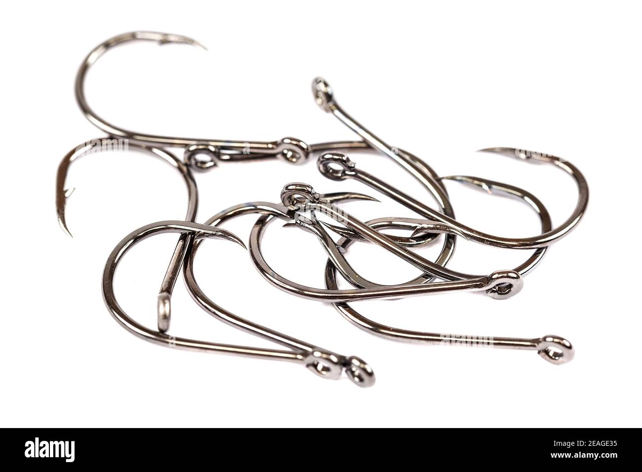 Fishing hooks isolated on white background Stock Photo - Alamy